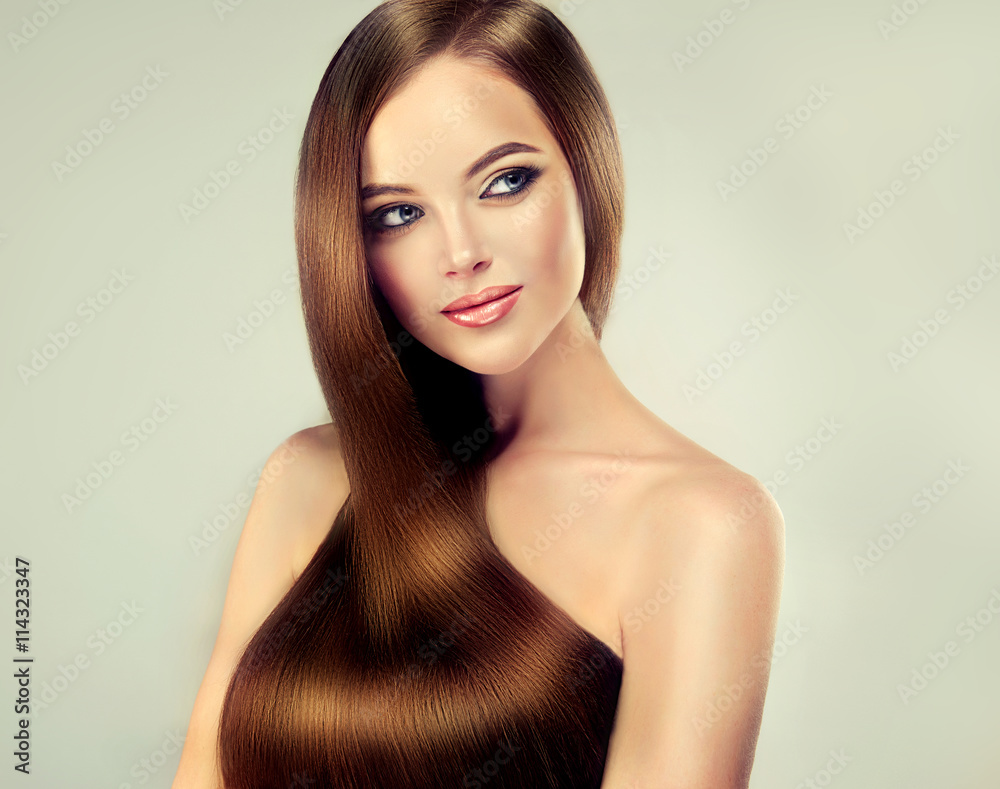 Beautiful brunette girl with long straight smooth hair . A woman with ...