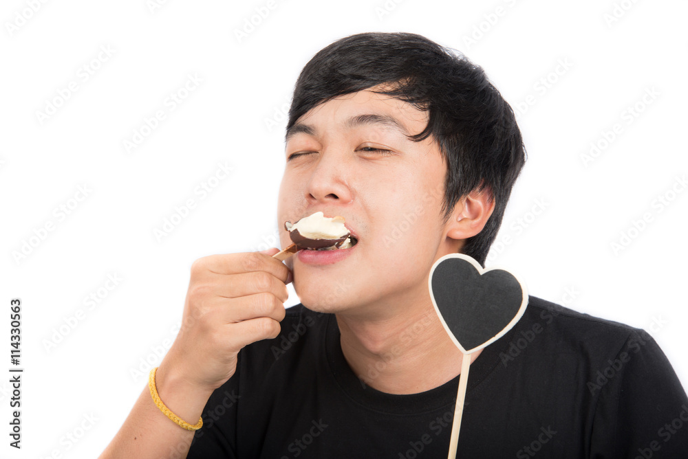 Asian man eating ice cream on white background Stock Photo | Adobe Stock