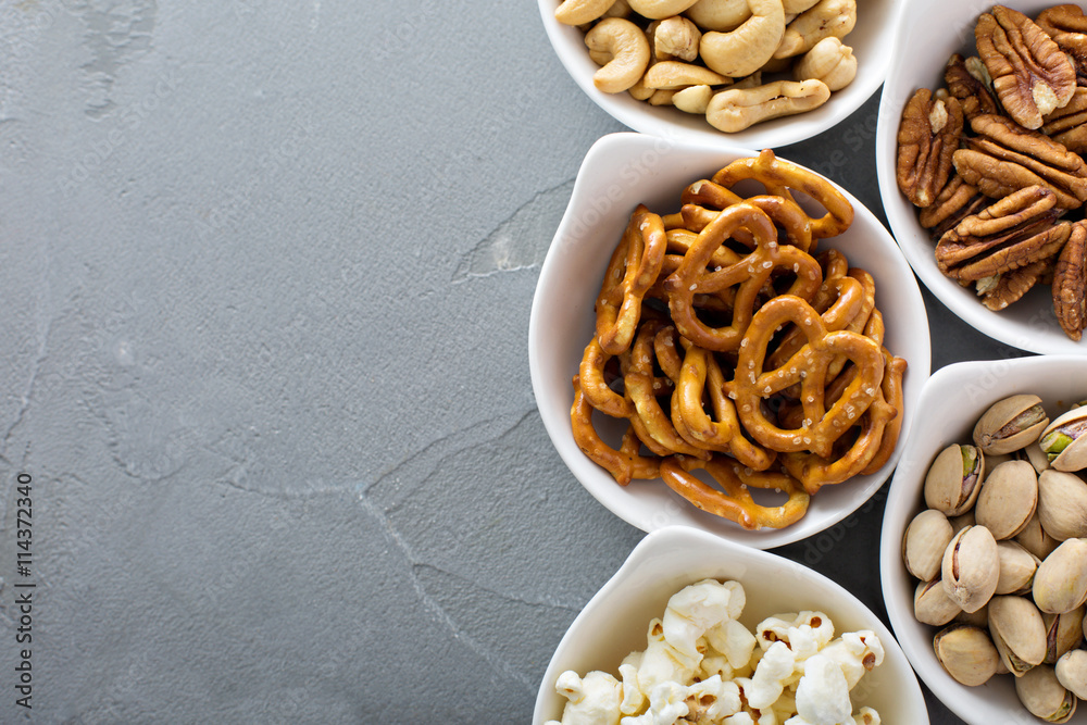 Variety of healthy snacks in white bowls Stock Photo | Adobe Stock
