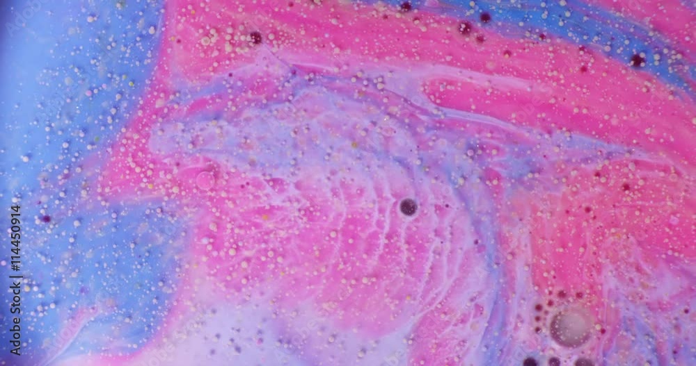 Color drop falling in water creating a Color spread. Colorful acrylic ...