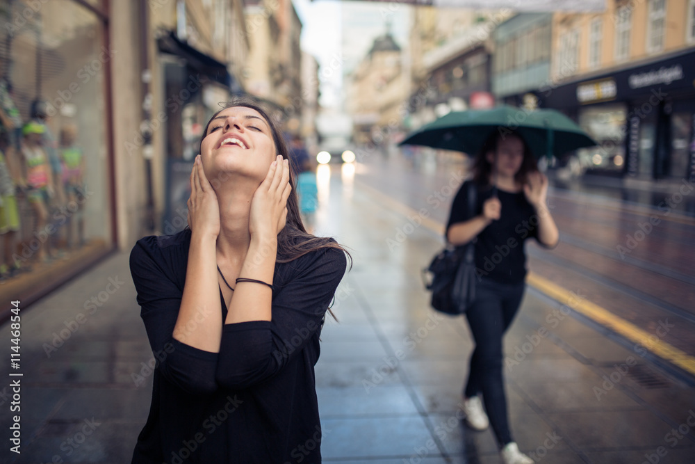 Fotka „woman Stands Under The Rain Screaming And Enjoying Portrait Of