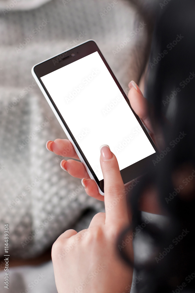 Brunette using cell phone with white screen. White screen for ...