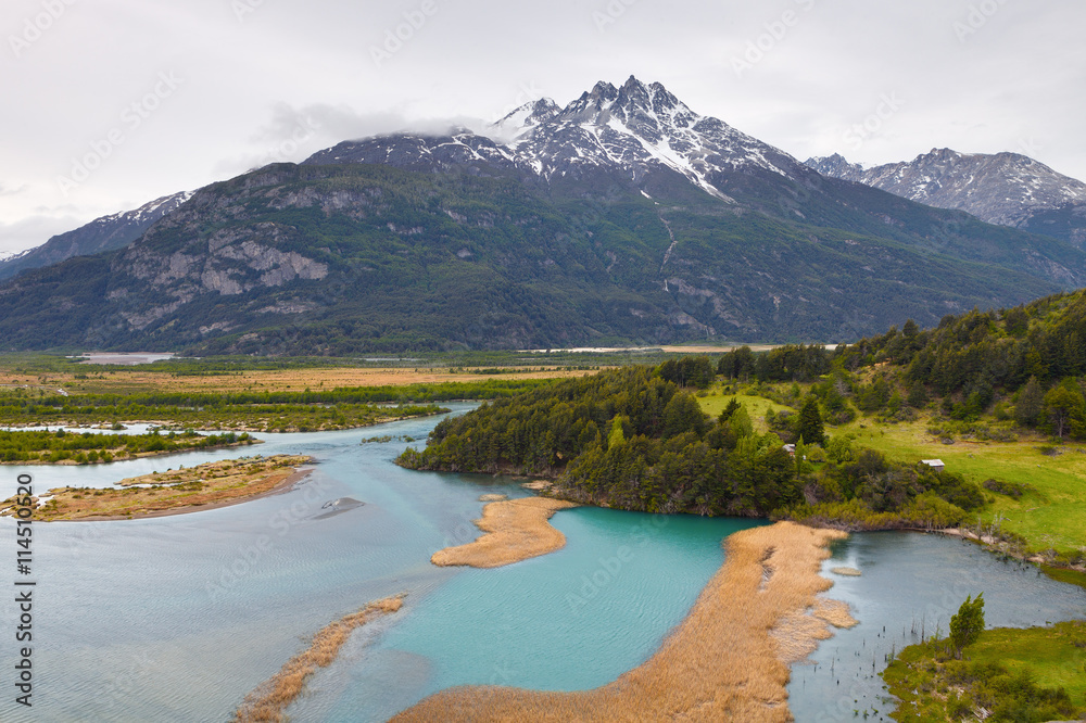 Landscape of chilean Patagonia, with meadows, the river Ibanez and the ...