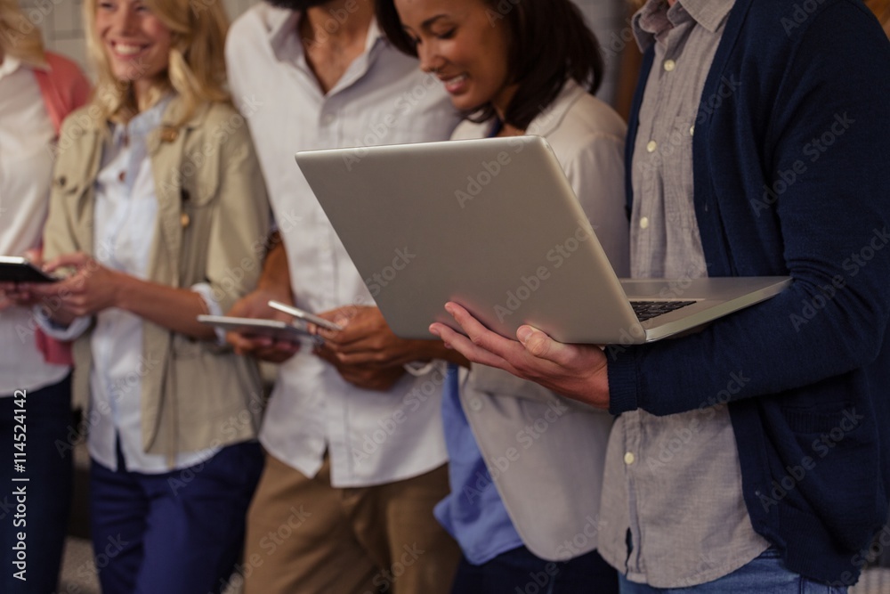 Friends using technology Stock Photo | Adobe Stock