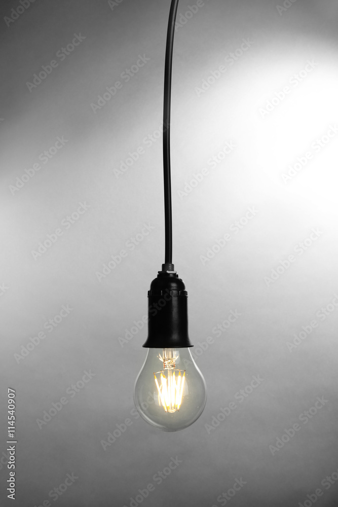 Light bulb on light background Stock Photo | Adobe Stock