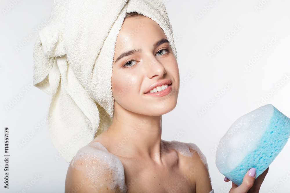 Girl is holding blue wisp with white foam foto de Stock | Adobe Stock