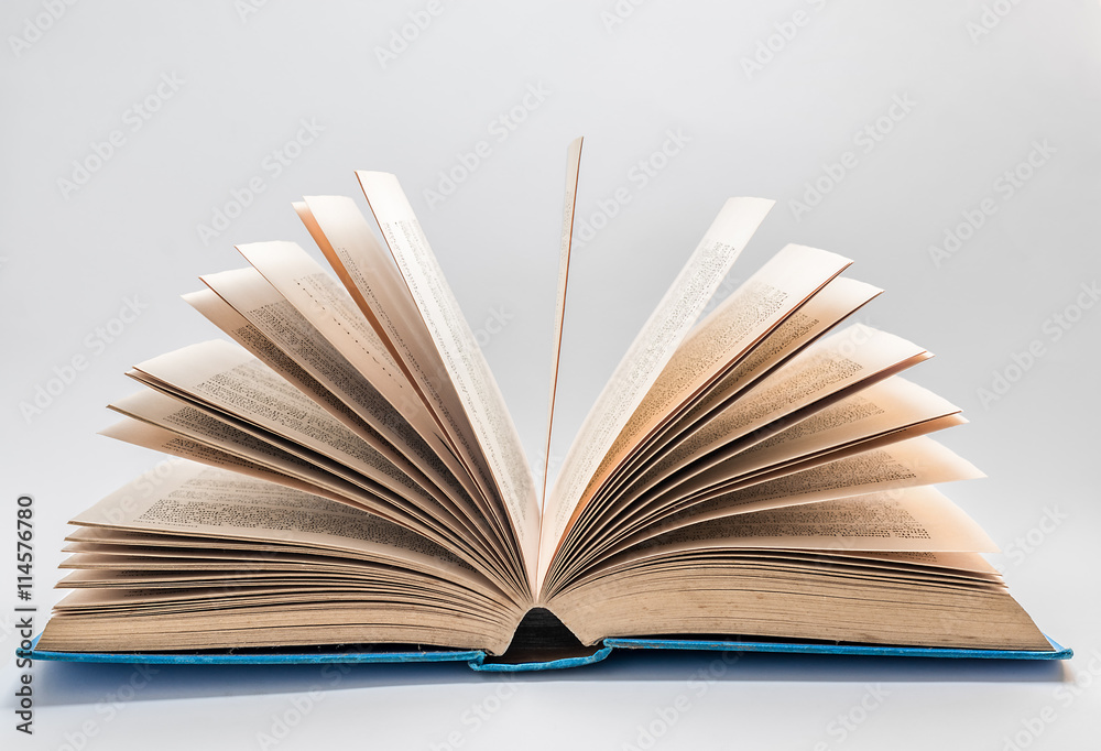 Old story book layed out horizontally with pages fanning out. Stock ...