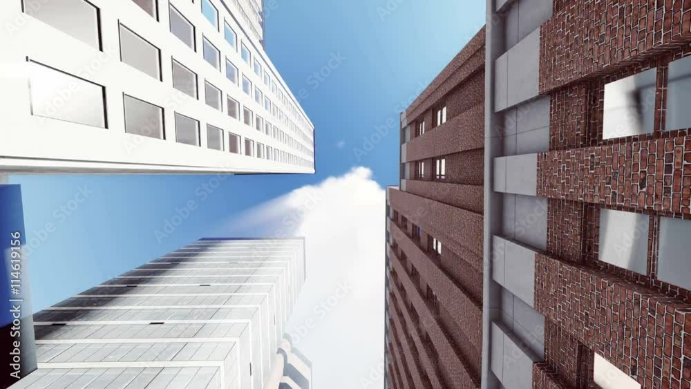 Motion looking up at abstract modern high rise office buildings against ...
