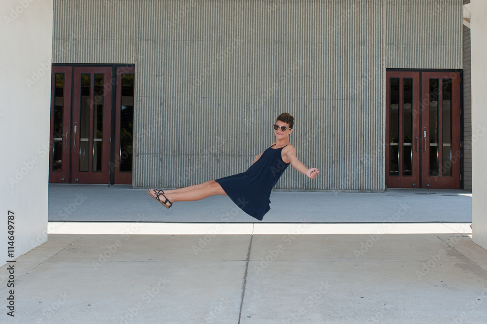 Floating teen resting in supine position in mid air. Stock Photo ...