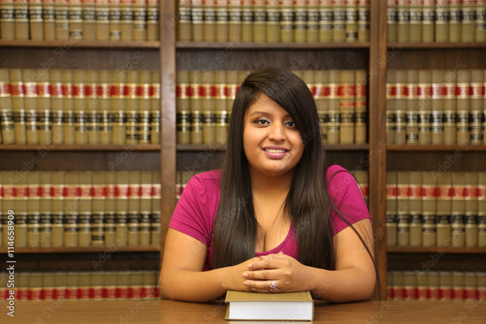 Young attractive hispanic paralegal Stock-Foto | Adobe Stock