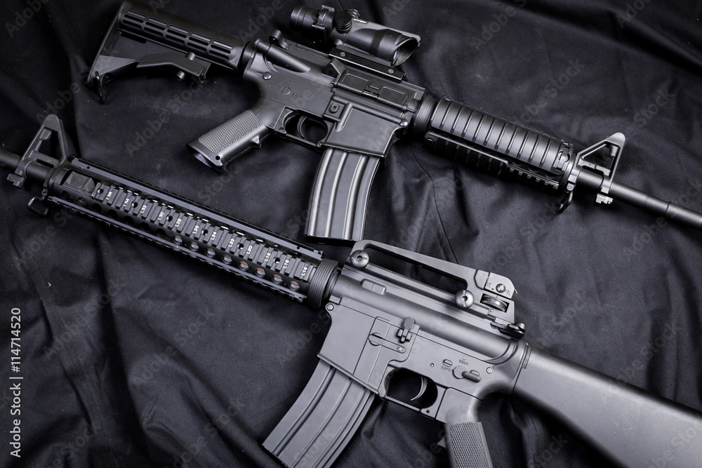 modern weapon, black background Stock Photo | Adobe Stock