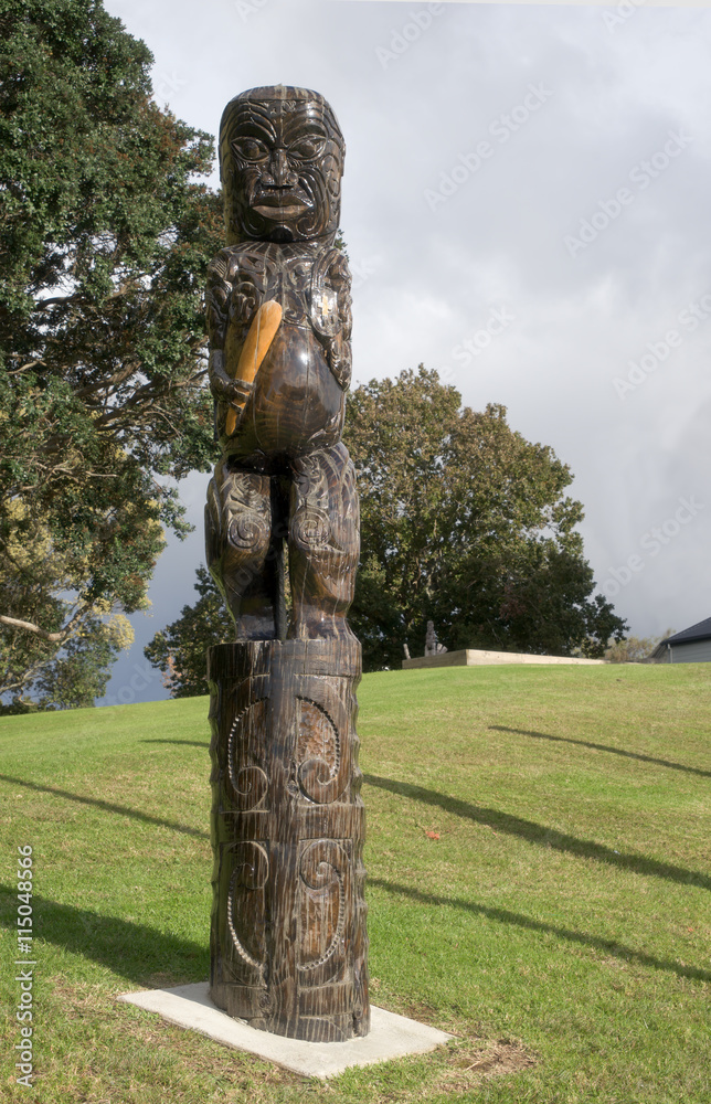 Maori carving style wood statue Stock Photo | Adobe Stock