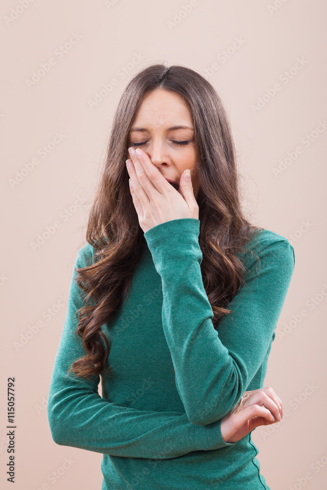 Portrait of tired girl who yawns Stock Photo | Adobe Stock