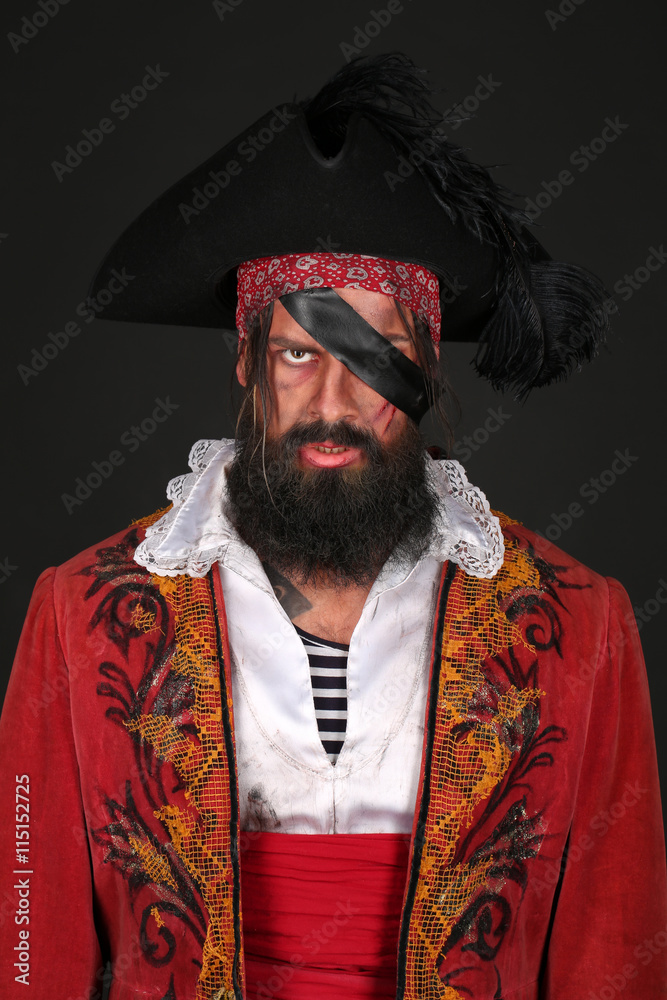 Portrait of handsome man in a pirate costume Stock 写真 | Adobe Stock