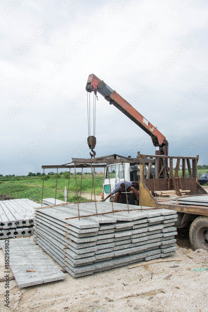hoisting a concrete slab with crane using metal slings Stock Photo ...