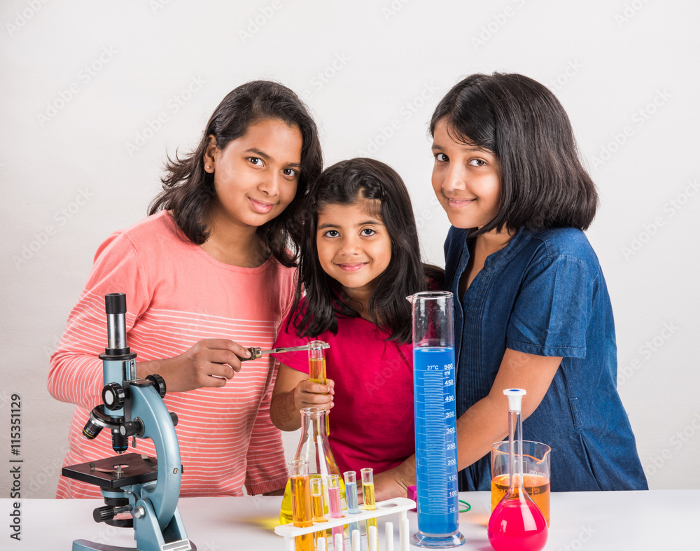 3 indian little girls or indian students and science experiments ...