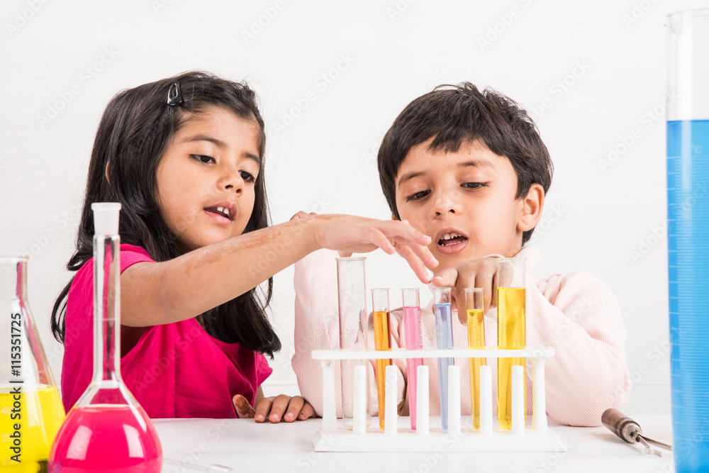 4 year old indian boy and girl doing science experiment, science Education. asian kids and ...