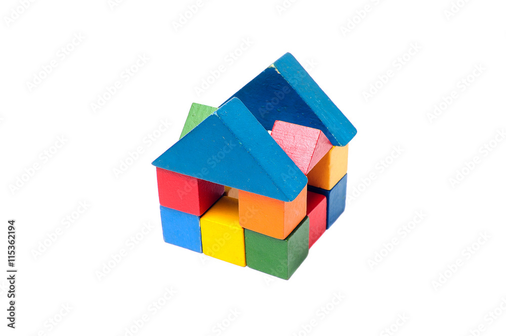 House made of old cubes. Wooden colorful building blocks isolated on ...