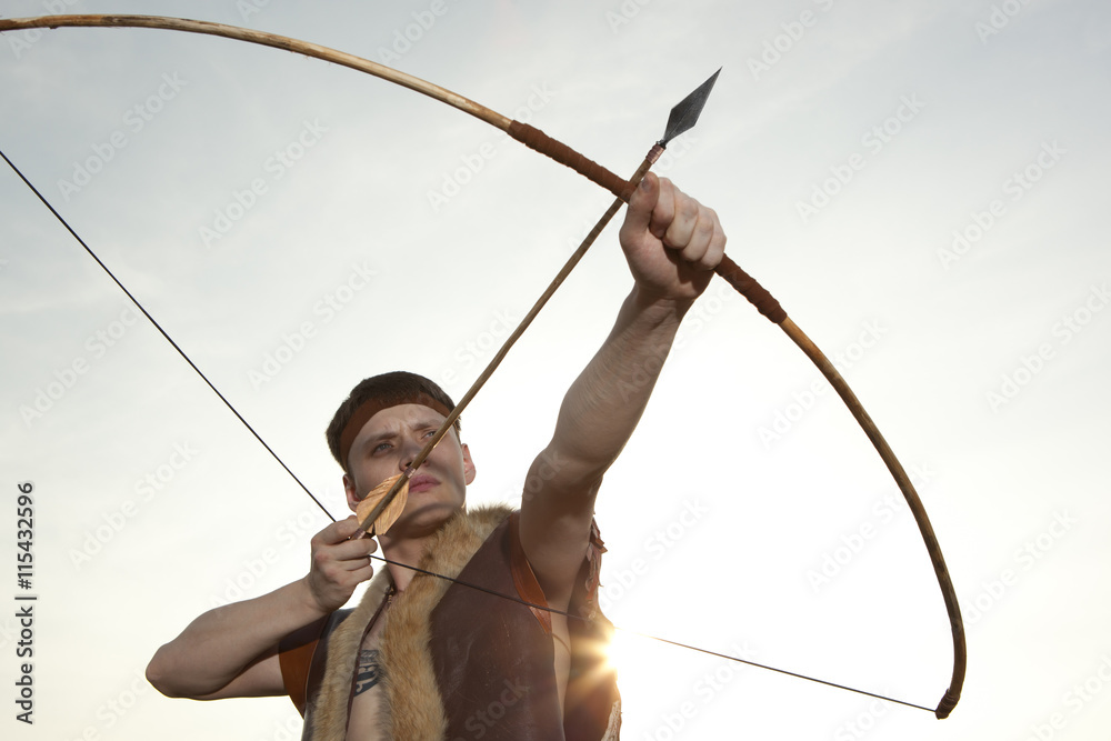 Robin Hood. Archer with arrow and long bow Stock Photo | Adobe Stock
