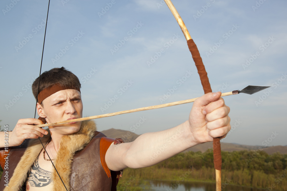 Robin Hood. Archer with arrow and long bow Stock Photo | Adobe Stock