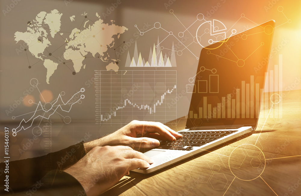 Laptop with business charts side Stock Photo | Adobe Stock