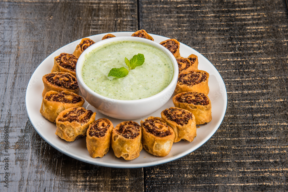 Indian spicy sweet fried snack also known as bakarwadi or bakarvadi or ...