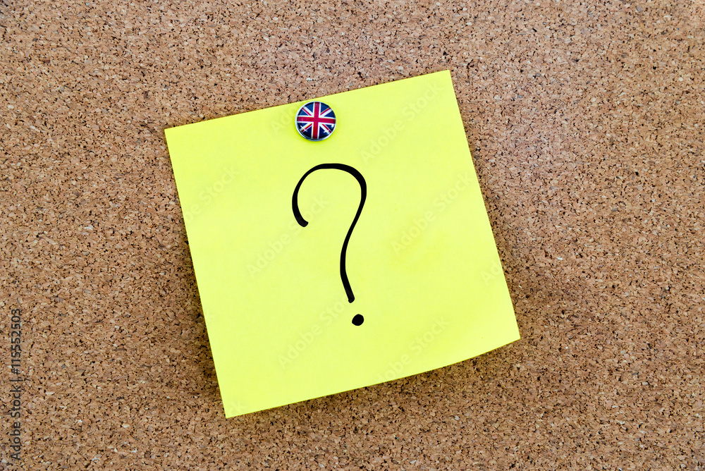 Yellow paper note pinned with Great Britain flag thumbtack and question ...