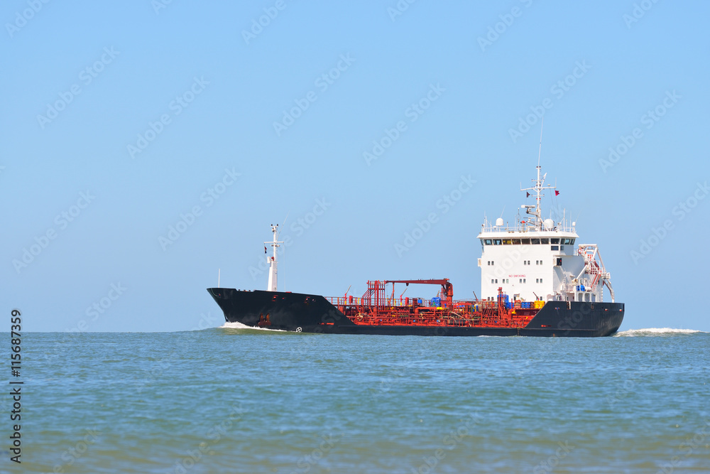 Cargo tanker ship sailing next to the coast of Vlissingen, the ...