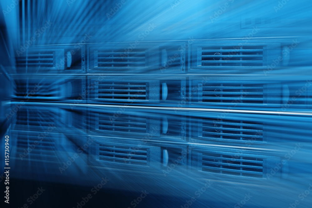 Foto de rack with blade behind bars mainframe in the data center blur ...