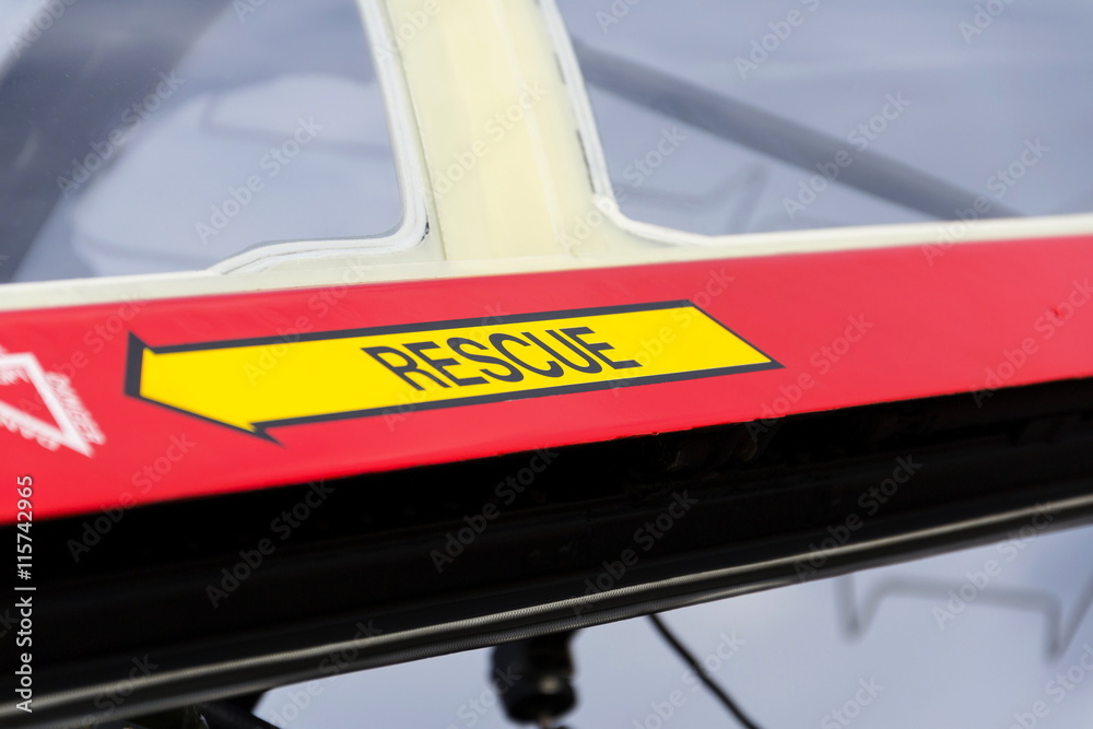 Yellow emergency rescue arrow sign on red military airplane jet Stock ...