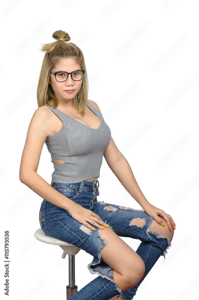 The girl poses sexy Sitting on a chair Stock Photo | Adobe Stock
