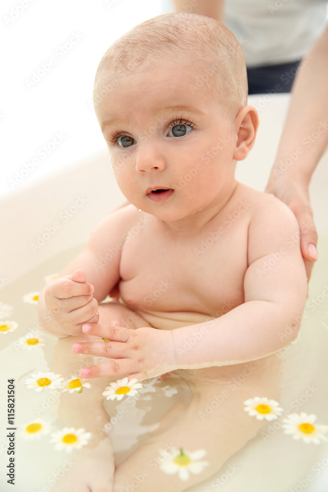 Cute baby bathing Stock Photo | Adobe Stock