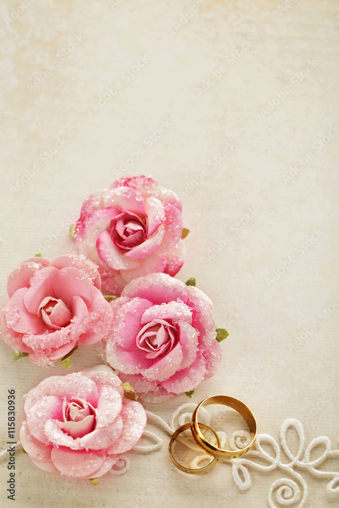 wedding rings and flowers on paper background. wedding invitation Stock ...