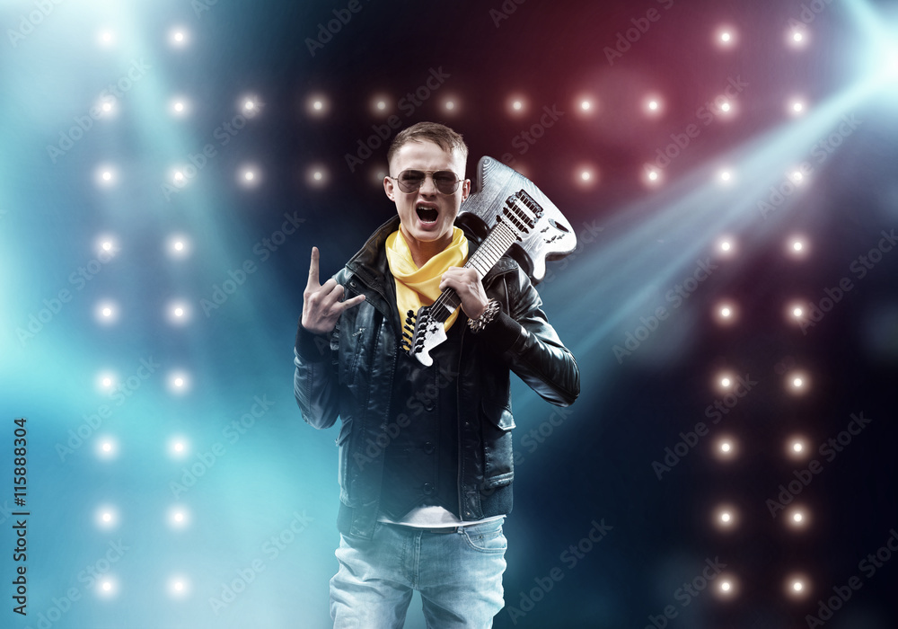 Rock star on stage Stock Photo | Adobe Stock