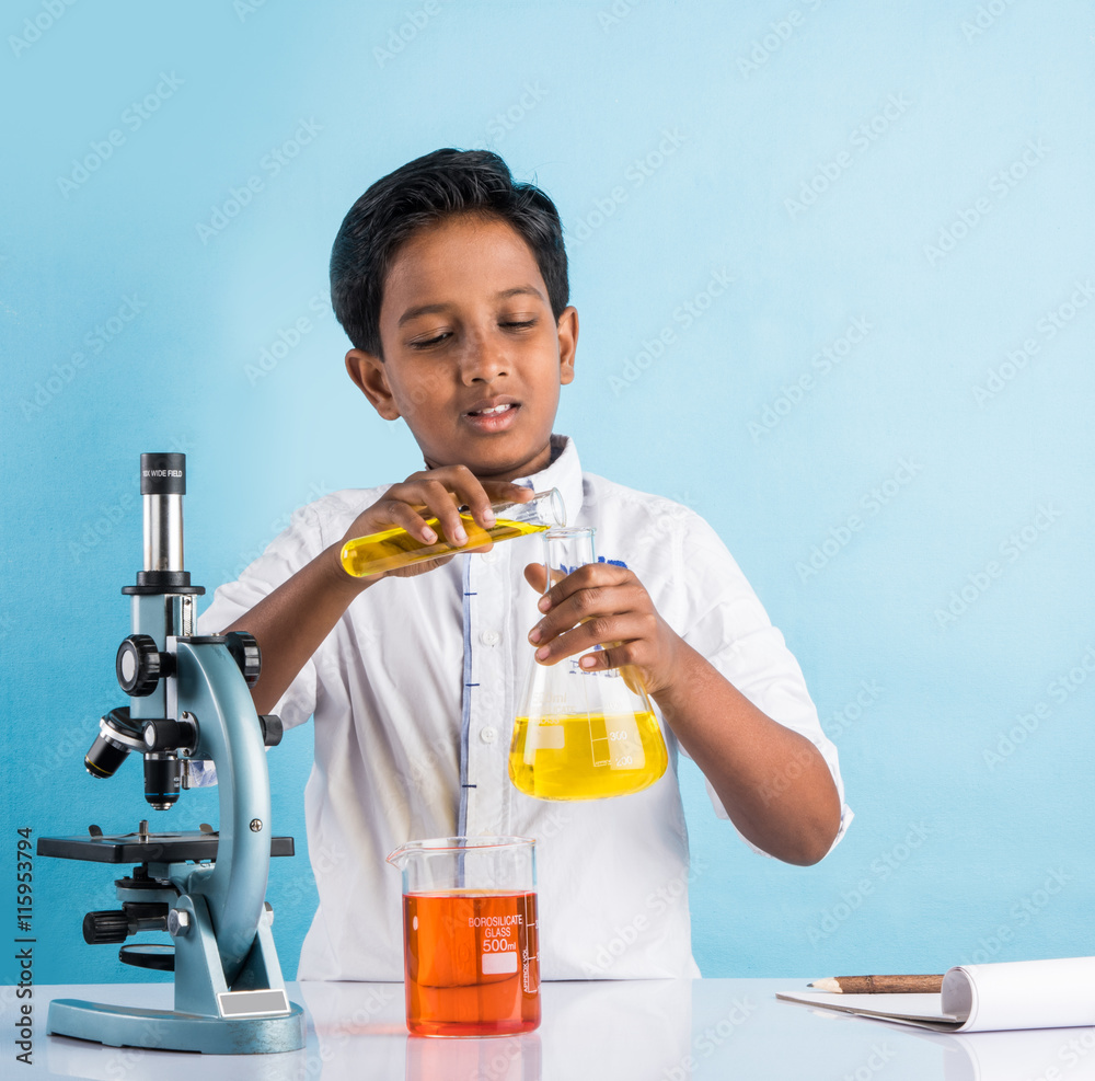 indian boy and chemistry experiment and microscope, asian boy with ...