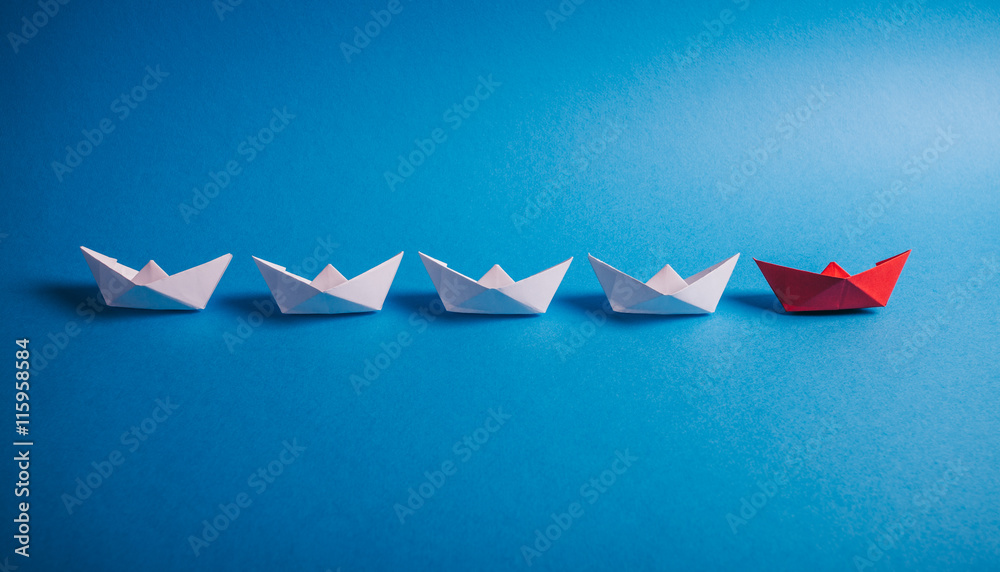 Origami paper boats. Concept for leadership, management, business ...