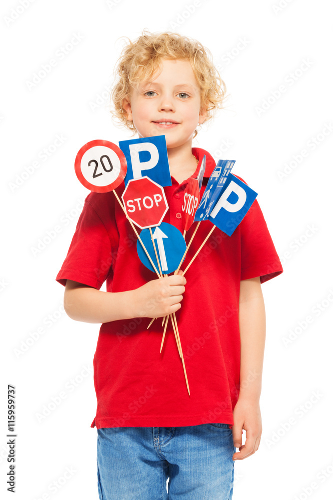 Cute boy studying traffic regulation rules Stock Photo | Adobe Stock