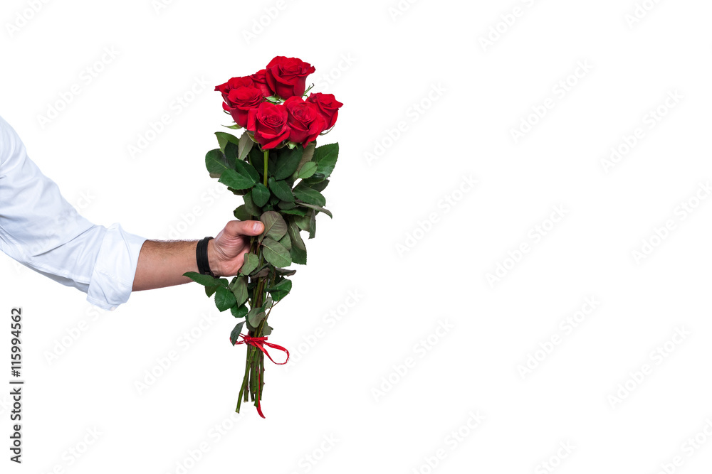 Bouquet of beautiful roses. Cropped shot of a young man's arm holding ...