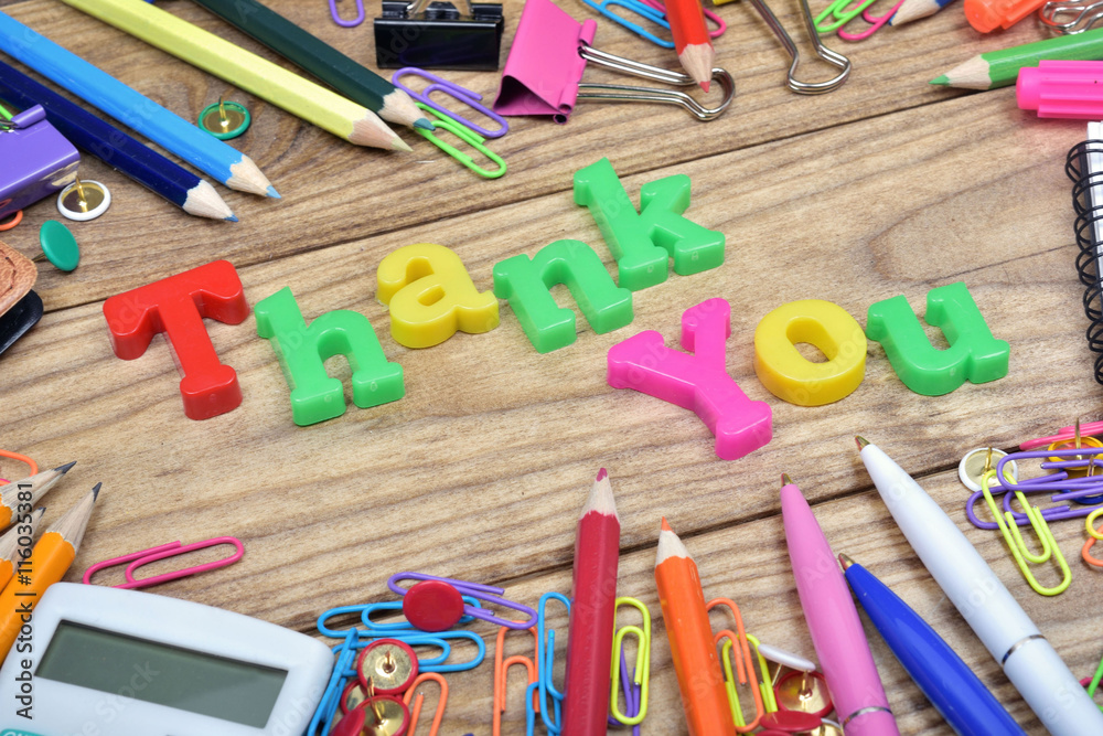 Thank You word and office tools on wooden table Stock Photo | Adobe Stock