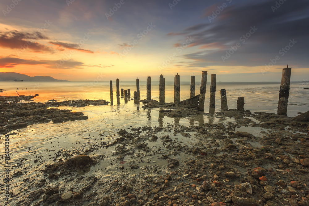 Destroyed pier during sunset at Pantai Robina, Pulau Pinang Malaysia ...