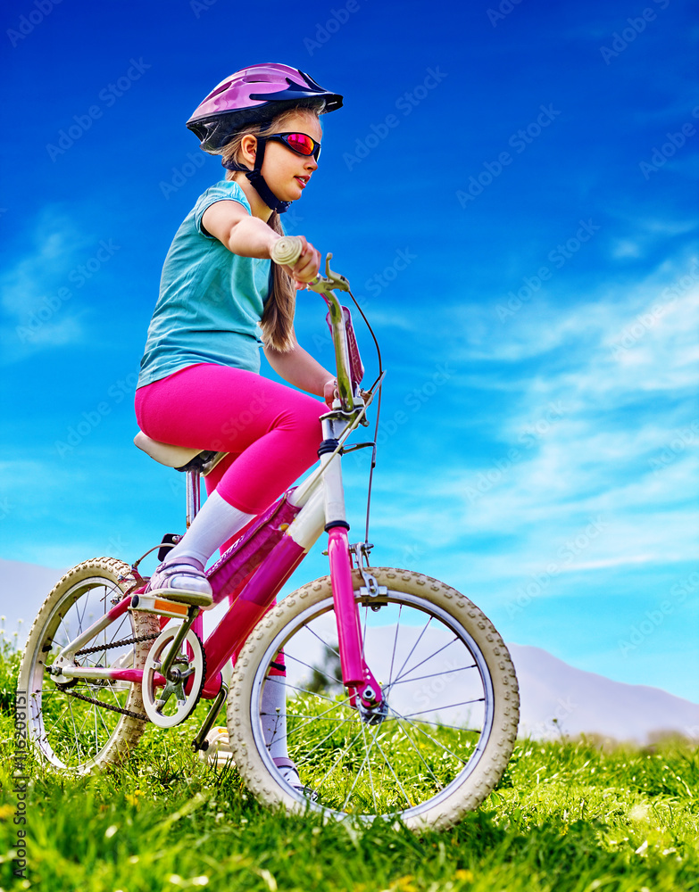 Bikes cycling child. Girl rides bicycle. Little girl in cycling ...