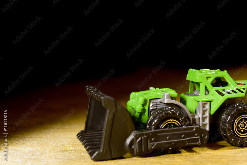 Bright Plastic Digger Toy Stock-Foto | Adobe Stock