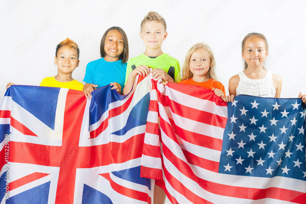 Funny kids holding flag Great Britain and american national flag Stock ...