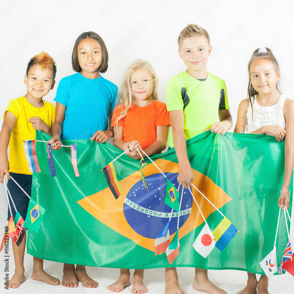 Group of children holding a Brazil flag Stock Photo | Adobe Stock