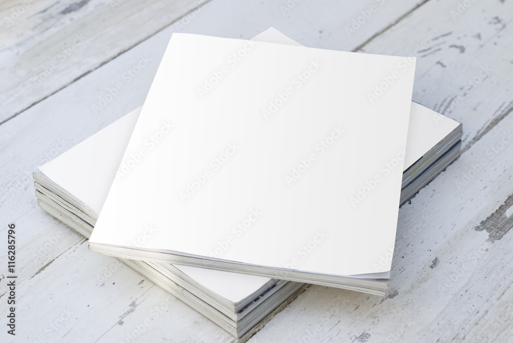 Mock-up magazine and catalog on the table, cover for your design. Most ...