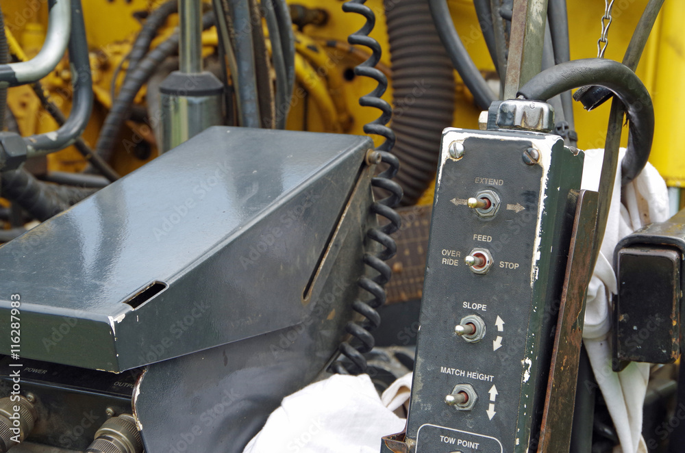 Asphalt road paver detail of switches and cables Stock Photo | Adobe Stock