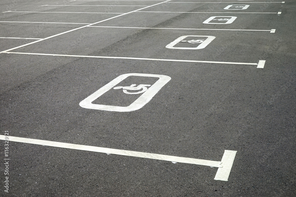 Road markings for the disabled. Diagonal image in the parking lot ...