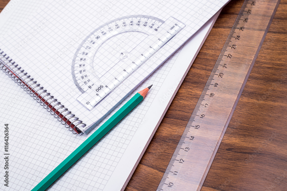 Ruler pen and notebook on a desk Stock Photo | Adobe Stock