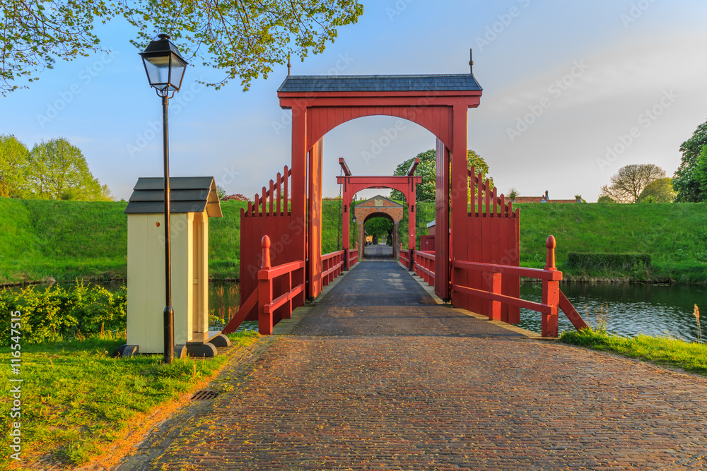 Entrance gate with guardhouse, Jetty, drawbridge and city gate with ...