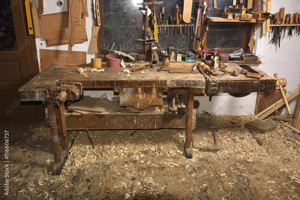 Old traditional carpenter's workshop with its wealth of tools and wood ...